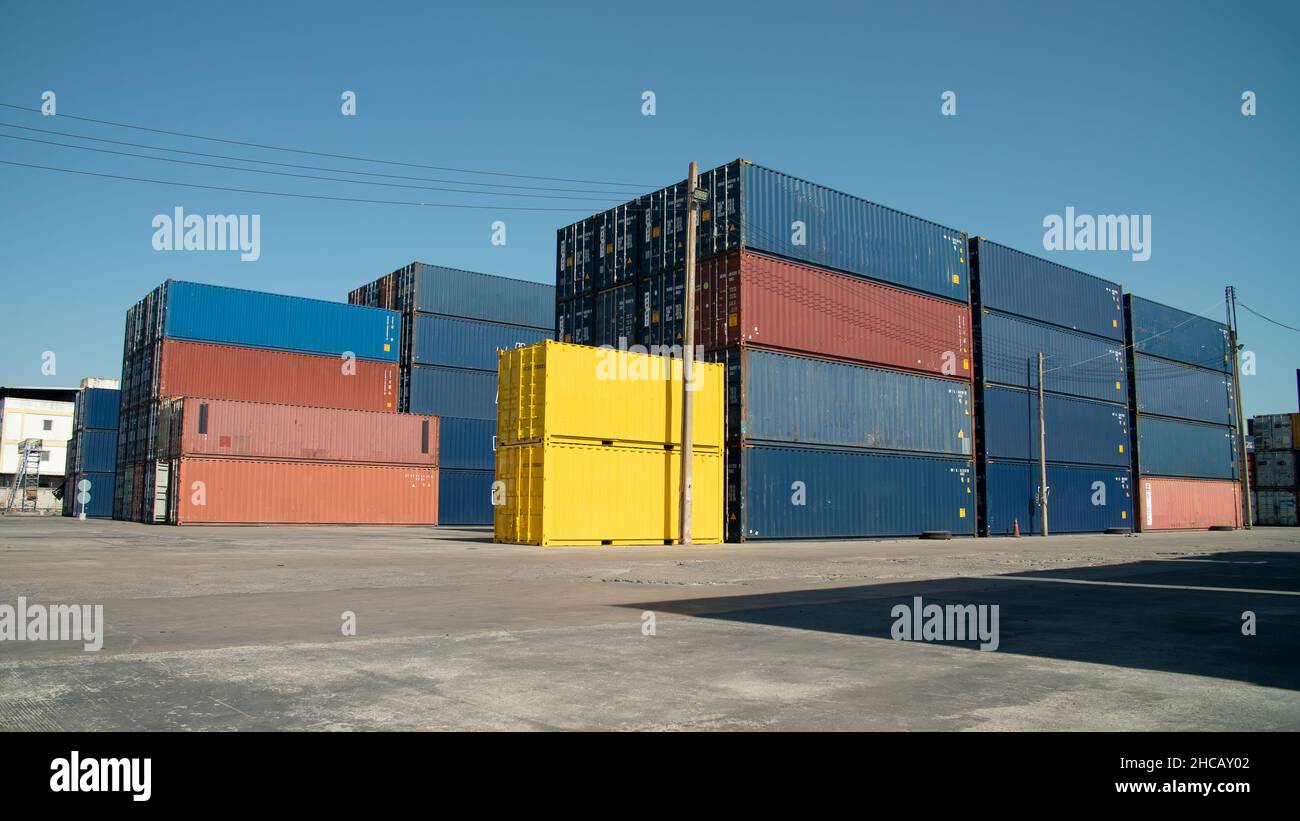Containers loading on harbor port Stock Photo - Alamy