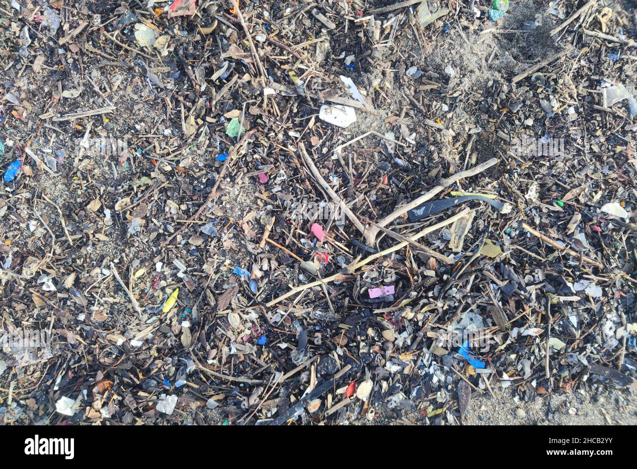 Plastic waste rubbish garbage on the sandy beach Stock Photo - Alamy