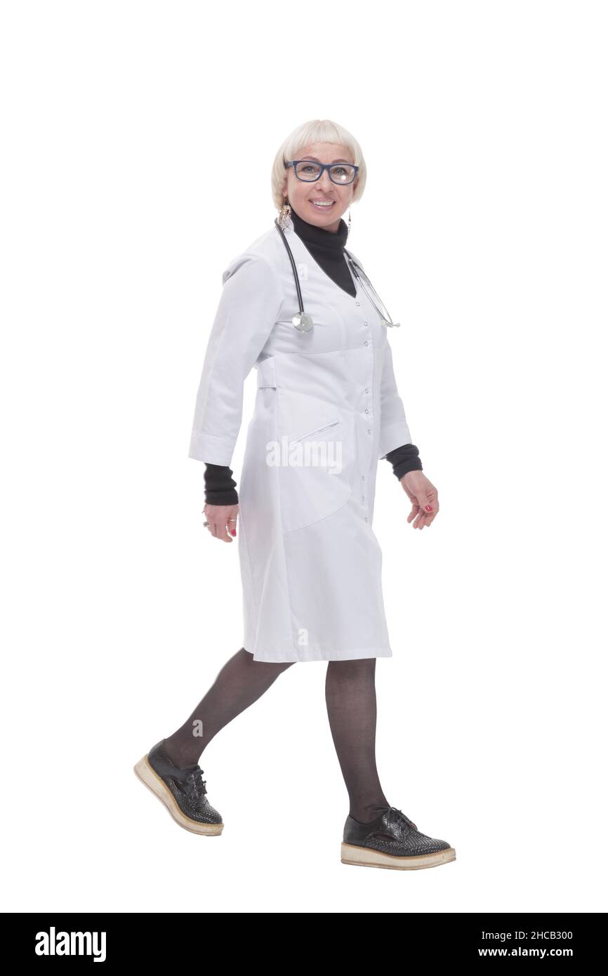 Qualified female doctor walking hi-res stock photography and images - Alamy