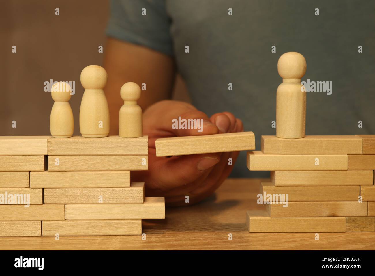 divisions and conflicts between people. Wooden silhouettes Stock Photo ...