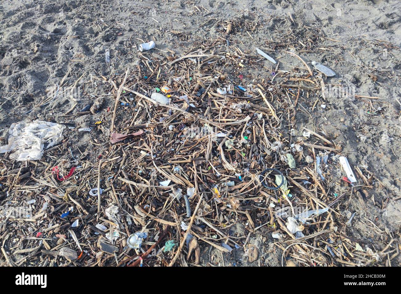 Plastic waste rubbish garbage on the sandy beach Stock Photo - Alamy