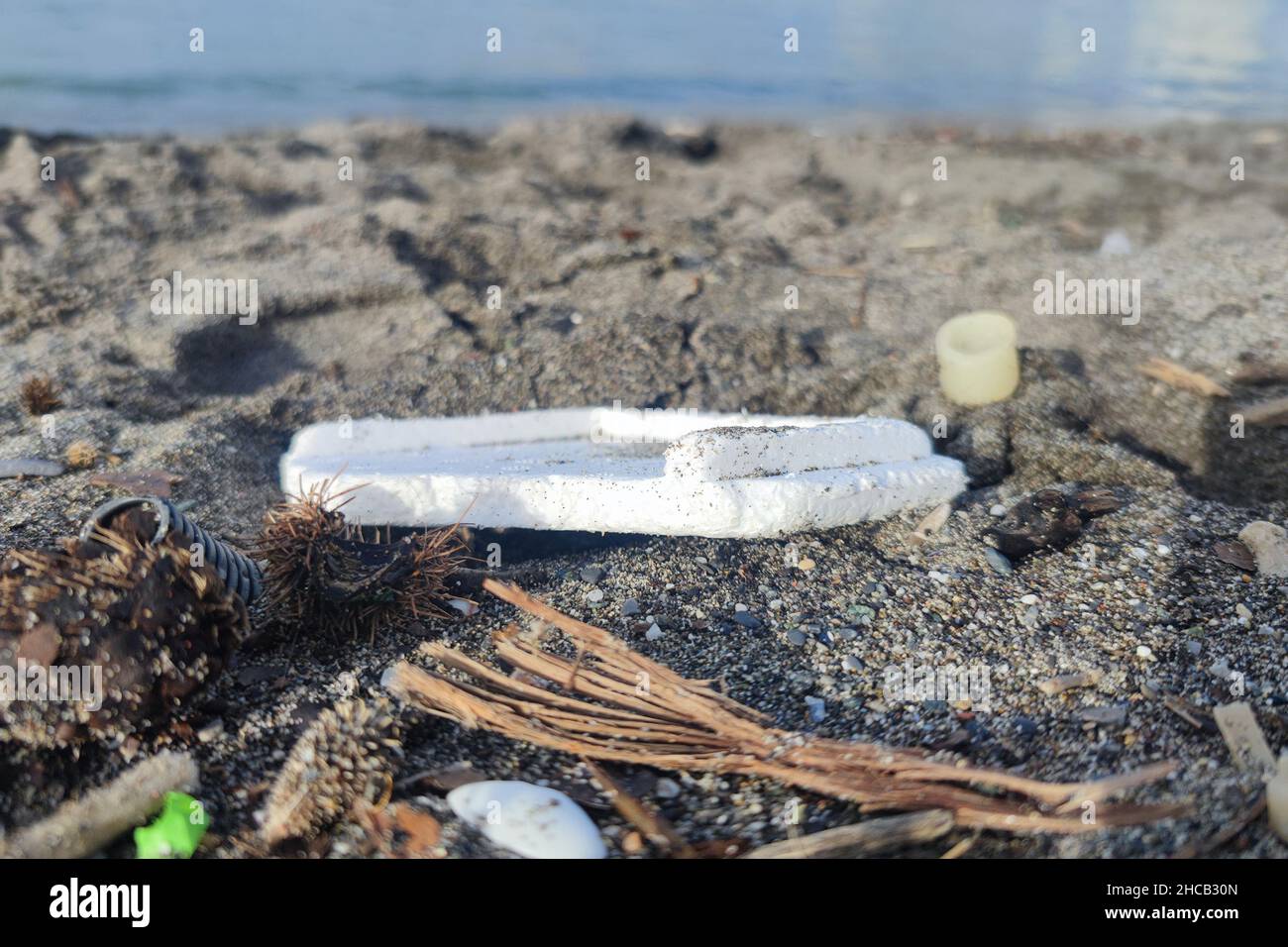 Plastic waste rubbish garbage on the sandy beach Stock Photo - Alamy