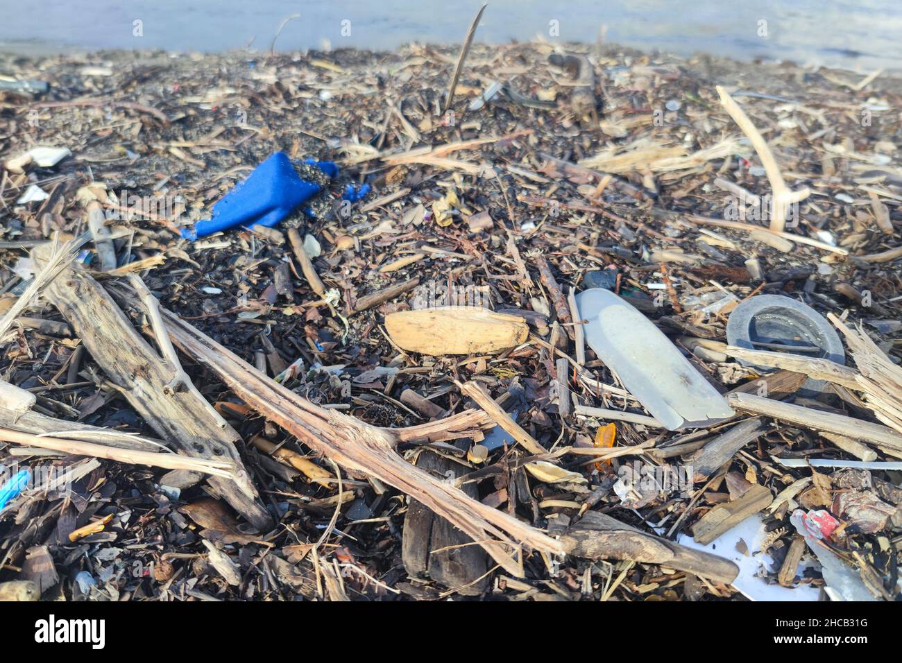 Plastic waste rubbish garbage on the sandy beach Stock Photo - Alamy