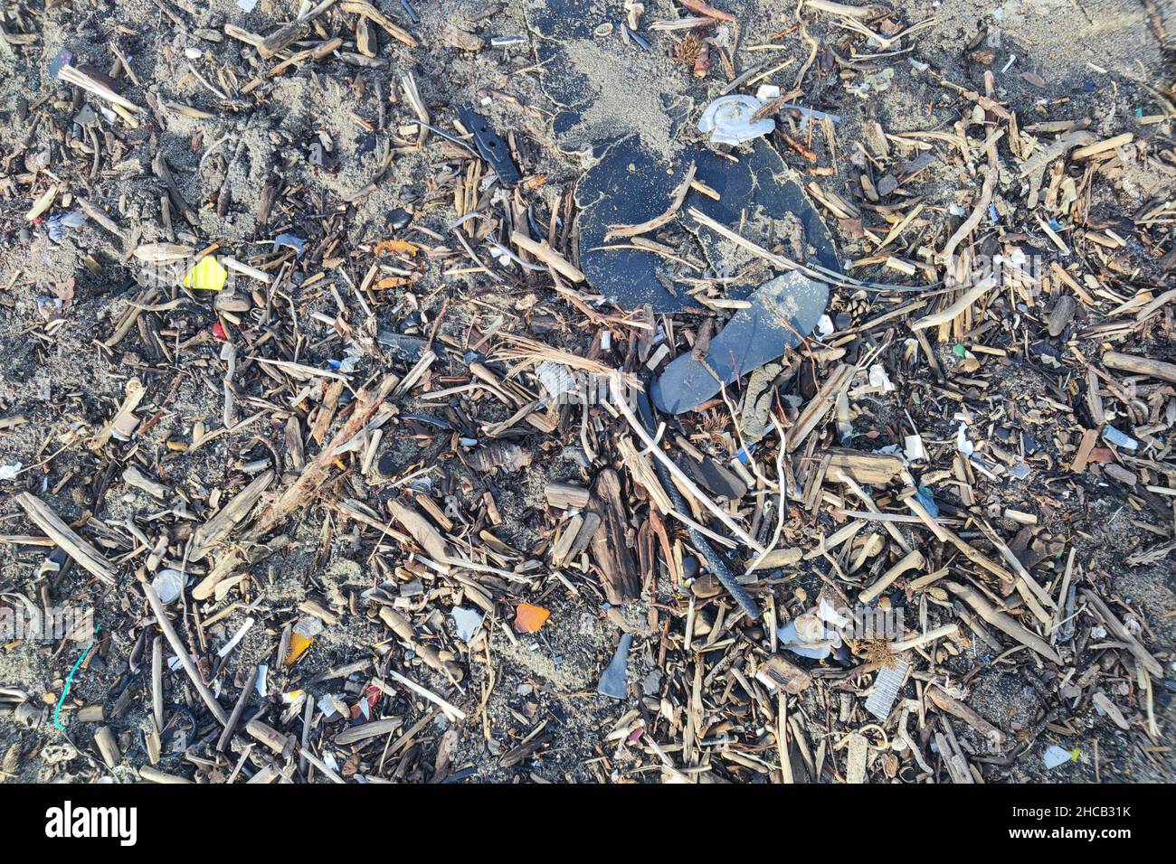 Plastic waste rubbish garbage on the sandy beach Stock Photo - Alamy