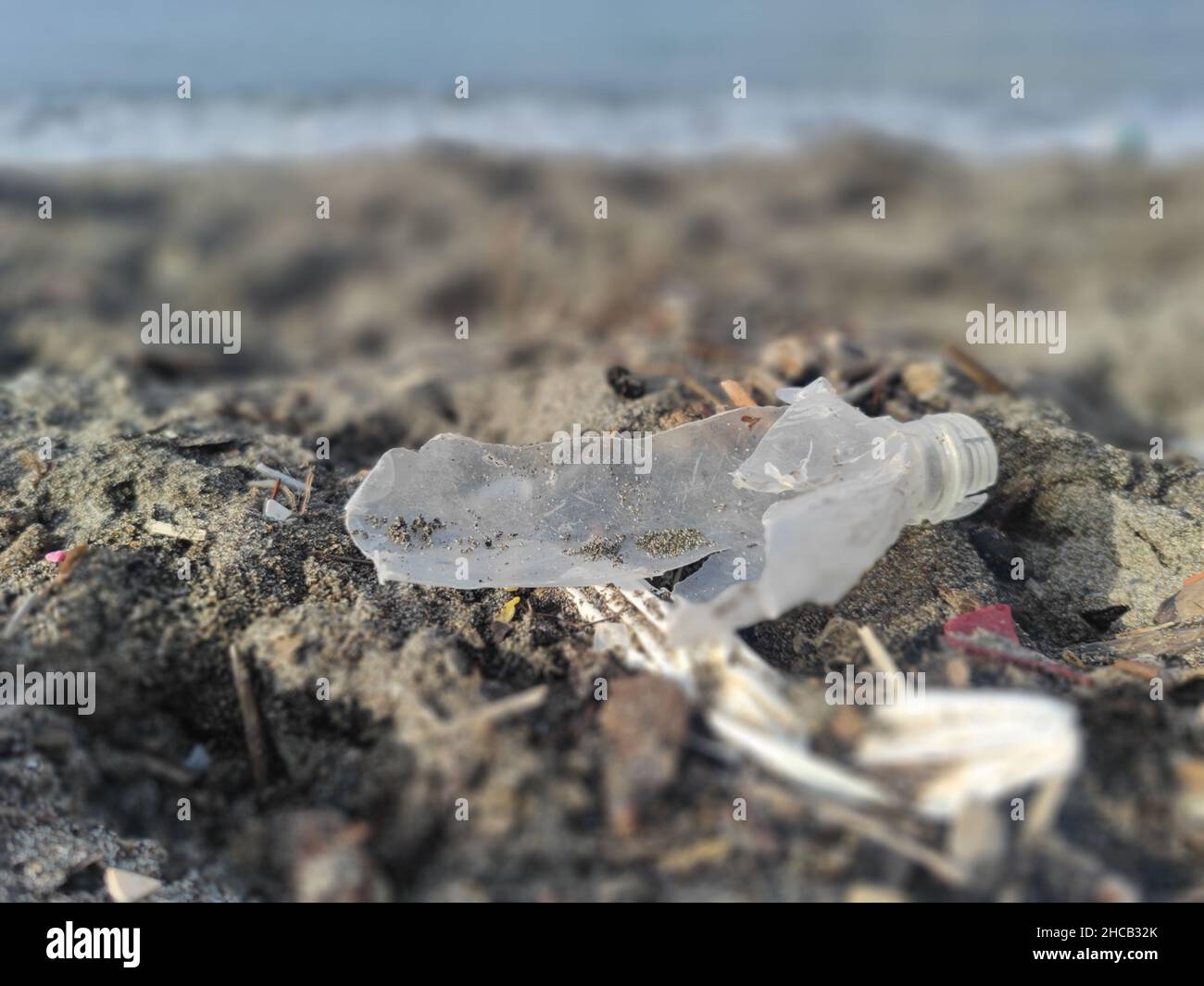 Plastic waste rubbish garbage on the sandy beach Stock Photo - Alamy