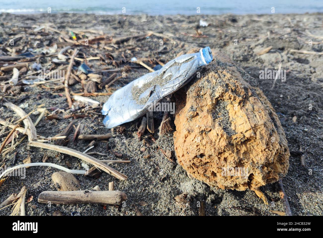 Plastic waste rubbish garbage on the sandy beach Stock Photo - Alamy