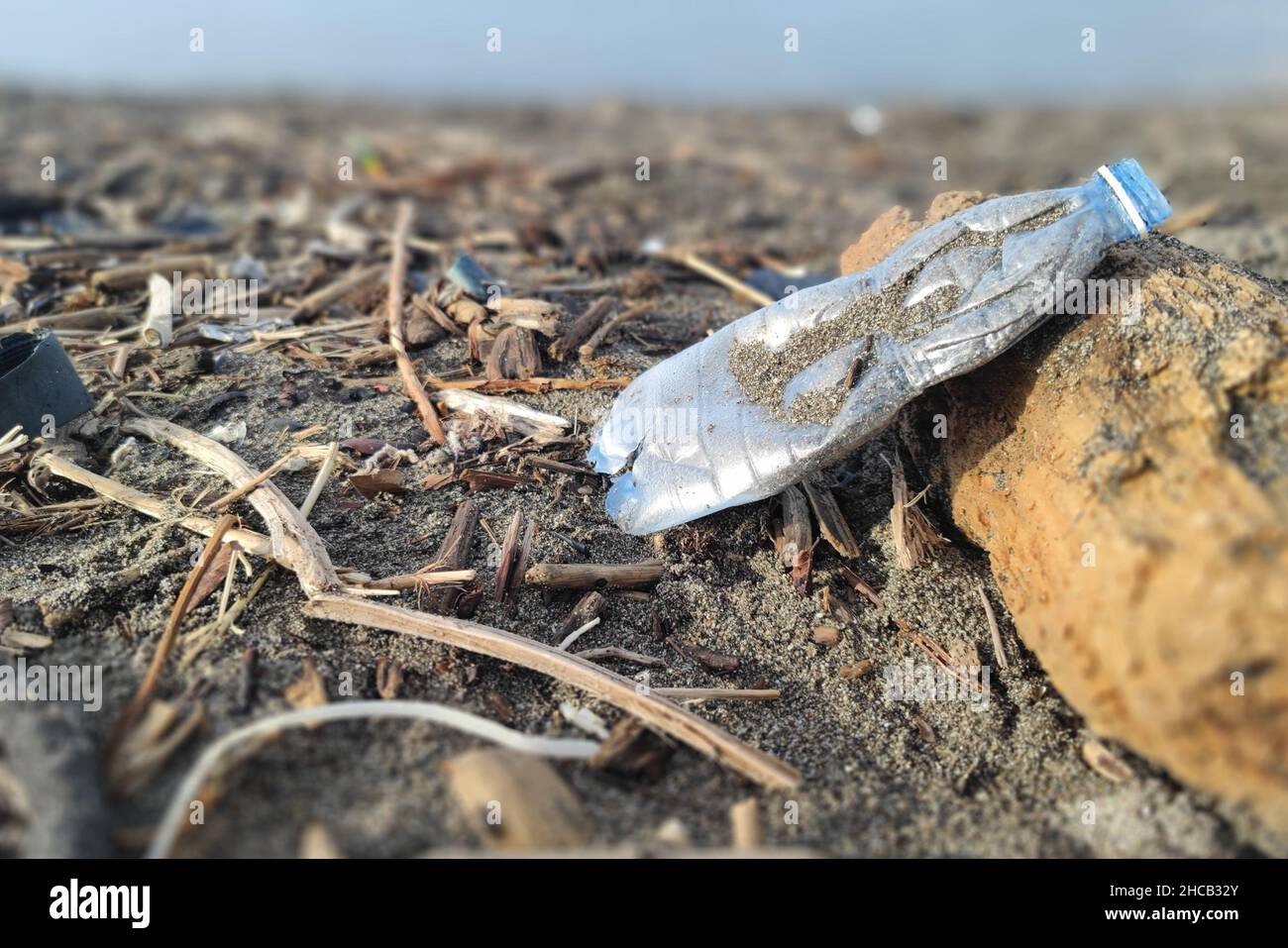 Plastic waste rubbish garbage on the sandy beach Stock Photo - Alamy