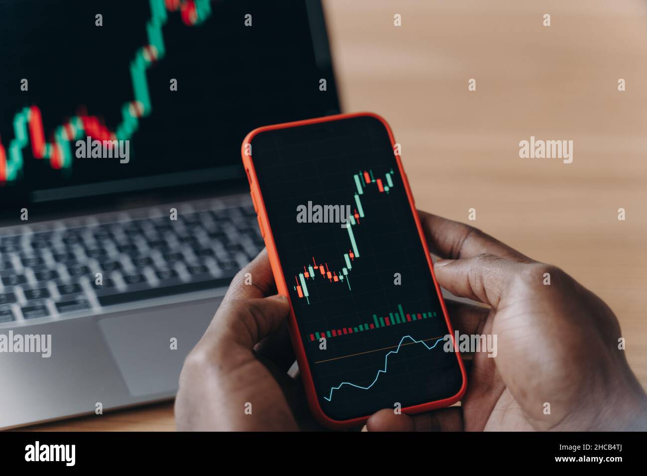 Businessman trader holds smartphone in hi-res stock photography and ...