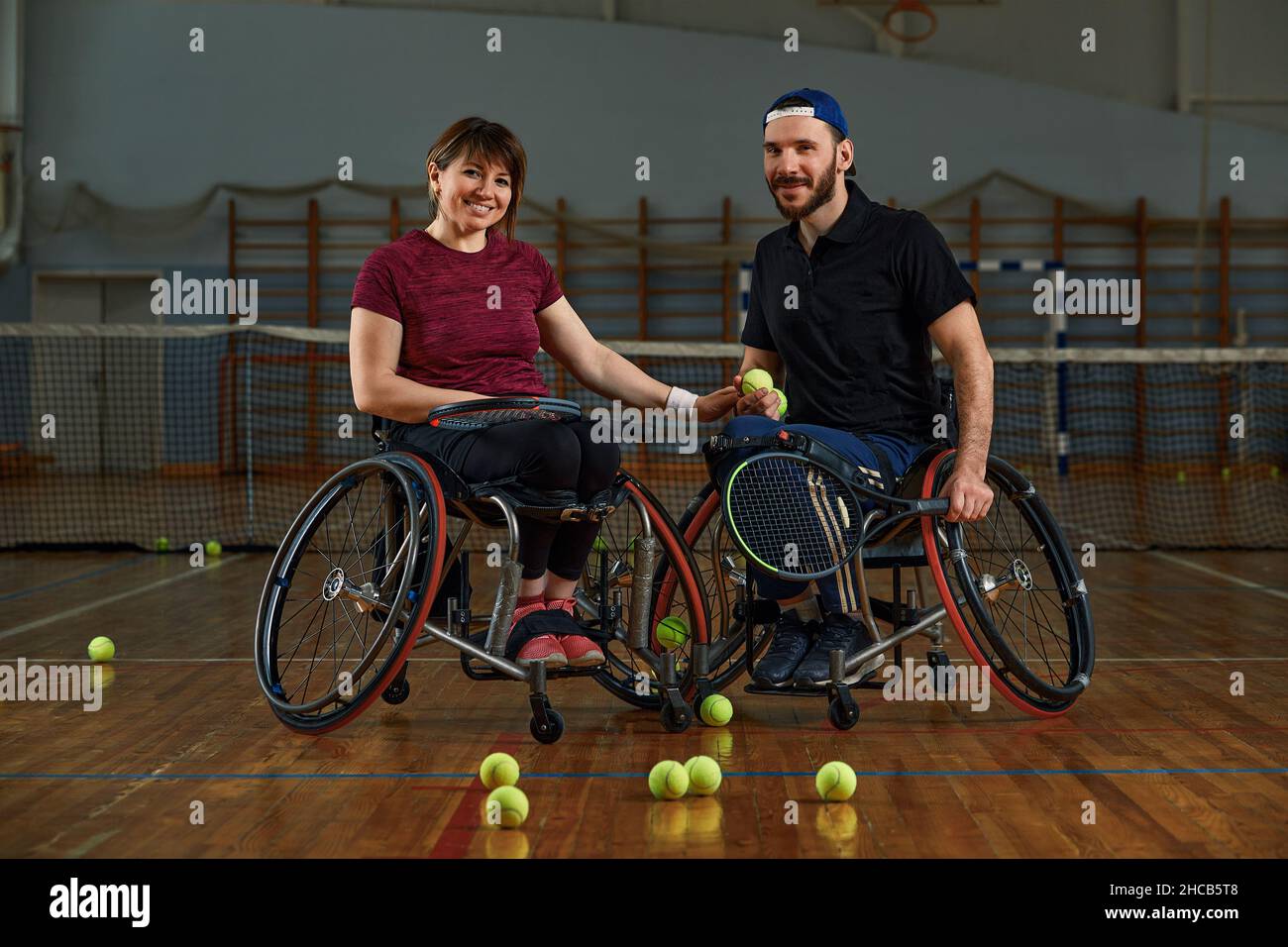 pair of disabled tennis players hugging each other and smiling Stock ... pair of disabled tennis players hugging each other and smiling Stock ...