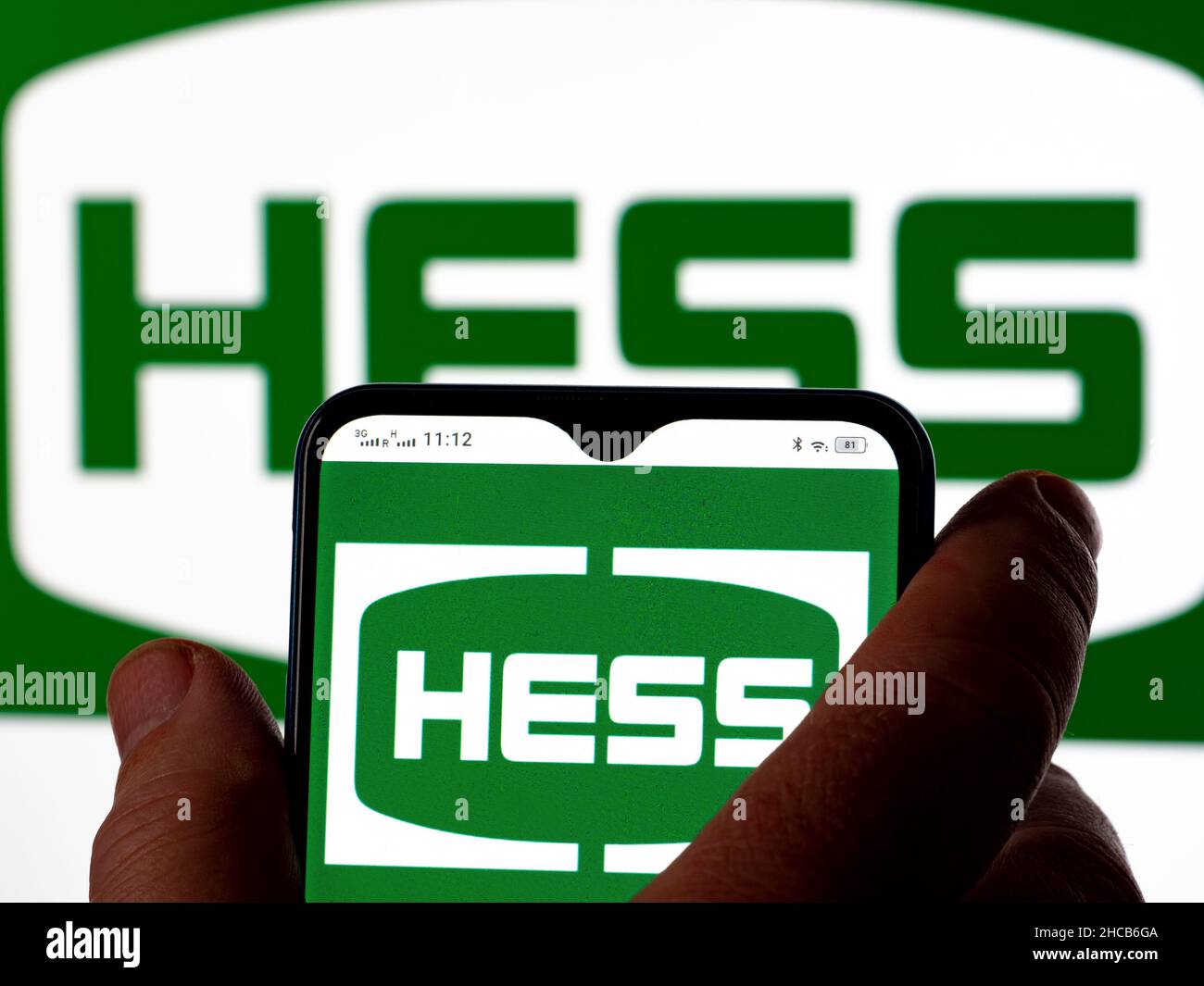 In this photo illustration Hess Corporation logo seen displayed on a ...