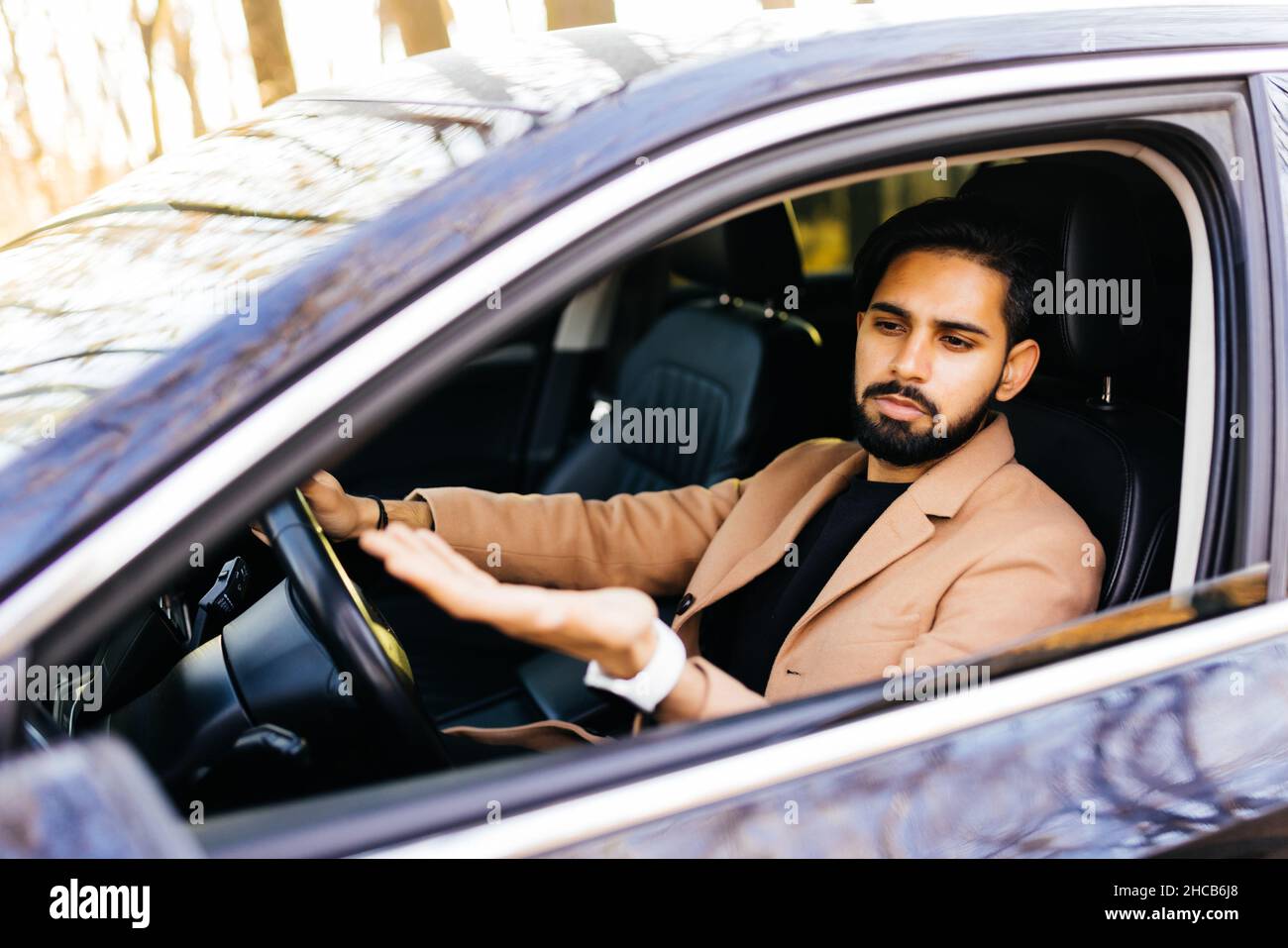 Male confused car driving hi-res stock photography and images - Alamy