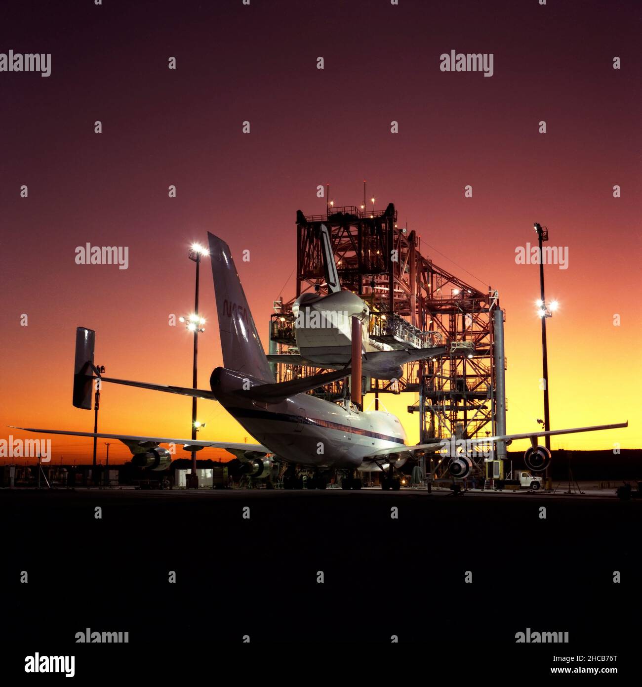 Shuttle Atlantis emerges from the Mate-Demate-Device mounted to Boeing ...