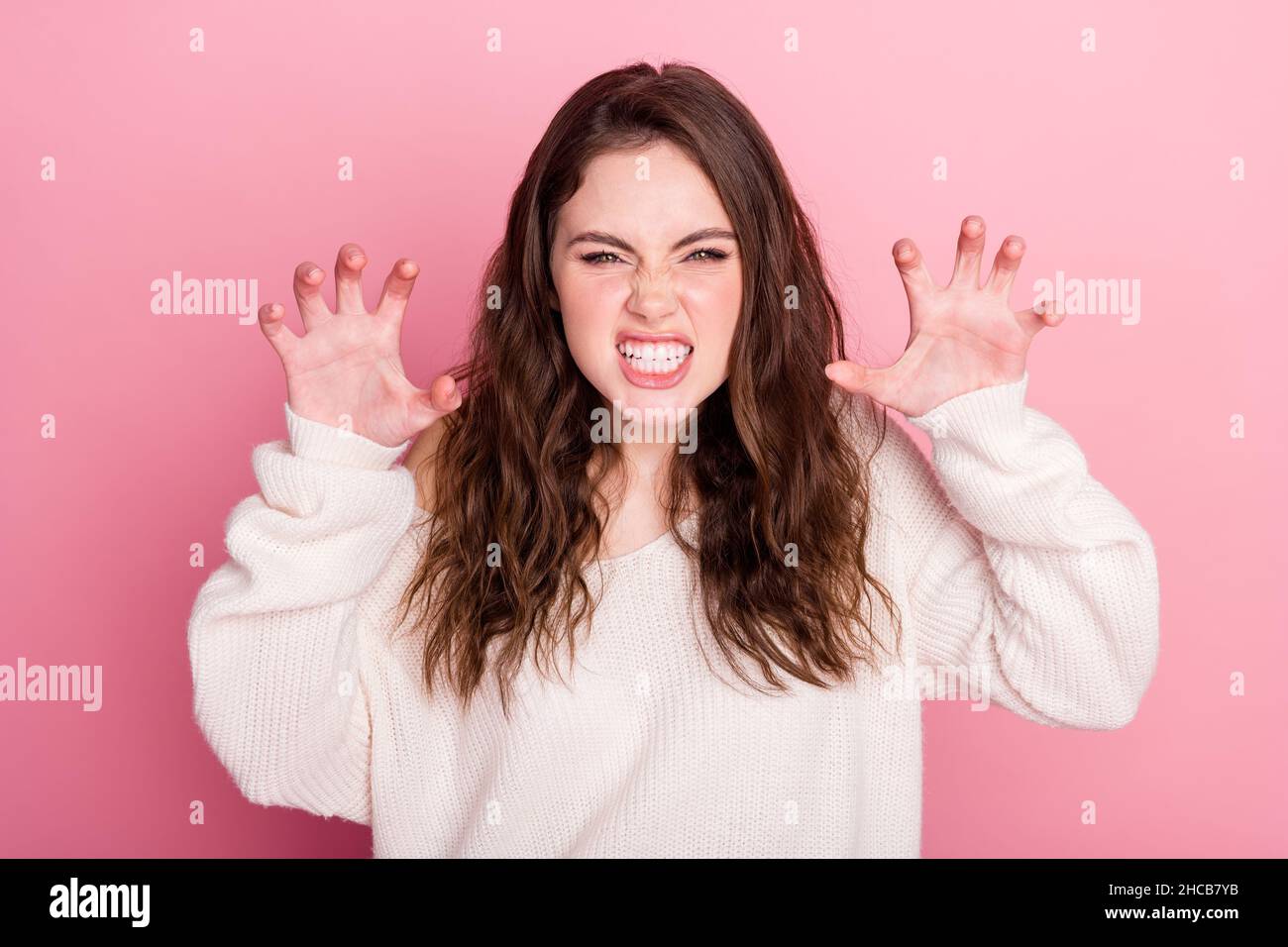 Photo of young attractive girl fooling show fingers claws growl lion ...