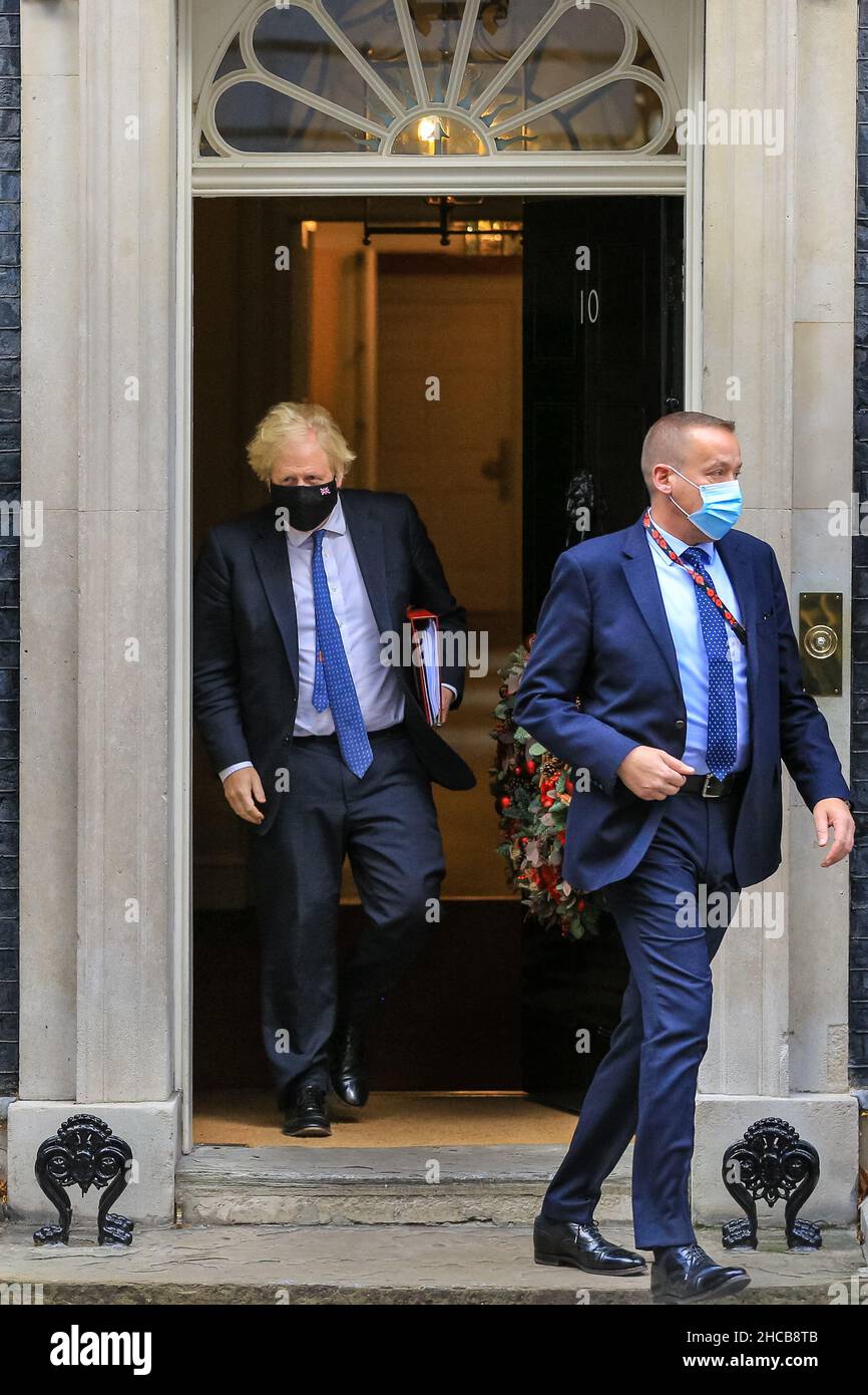 British Prime Minister Boris Johnson leaves 10 Downing Street with his ...