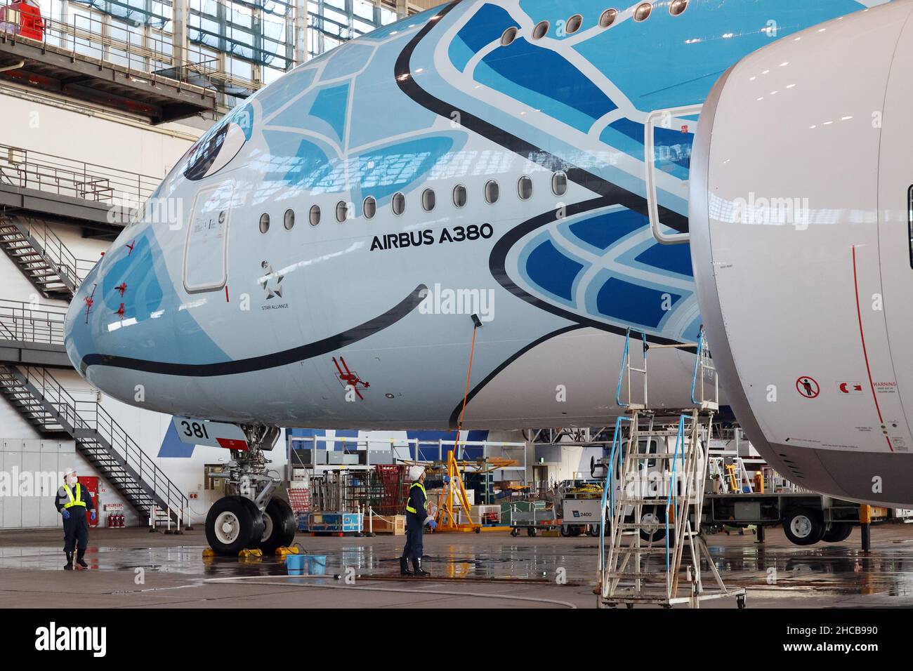 Narita, Japan. 27th Dec, 2021. Workers wash the world's largest ...