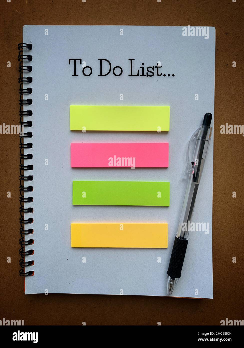 To Do List text on notepad with pen and colorful sticky note. Business ...