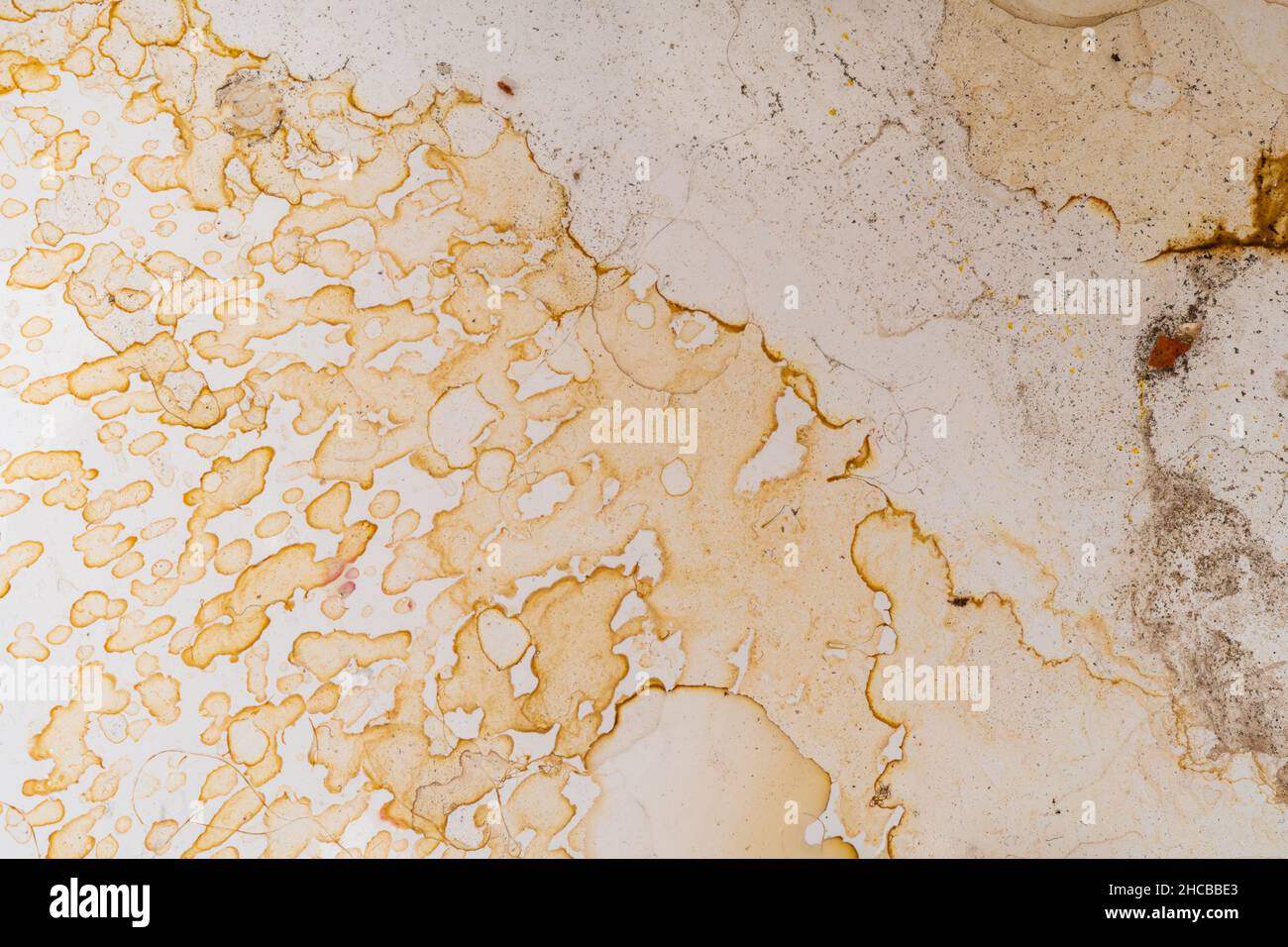 texture of a dirty stain on the surface of a gas stove as a background ...