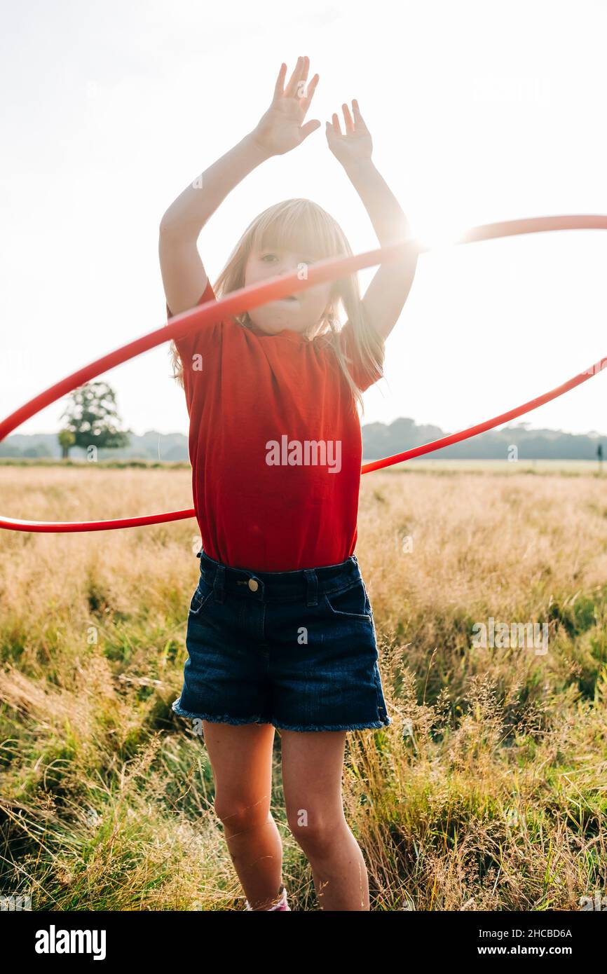 Girl spinning in meadow hi-res stock photography and images - Alamy