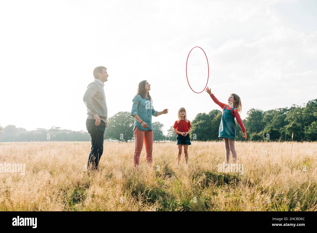 Hula hoop game children hi-res stock photography and images - Alamy