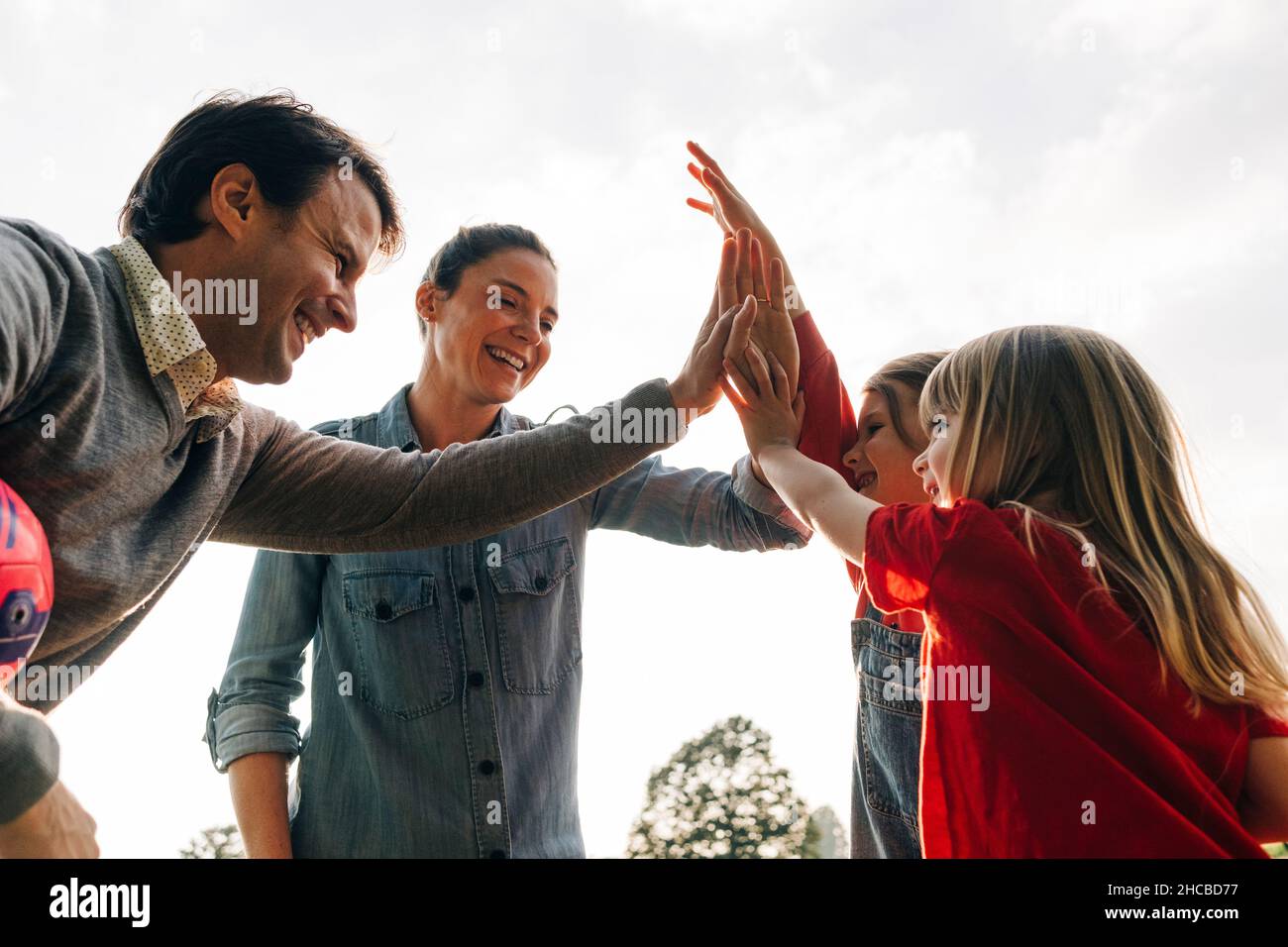 Man woman doing high five hi-res stock photography and images - Alamy
