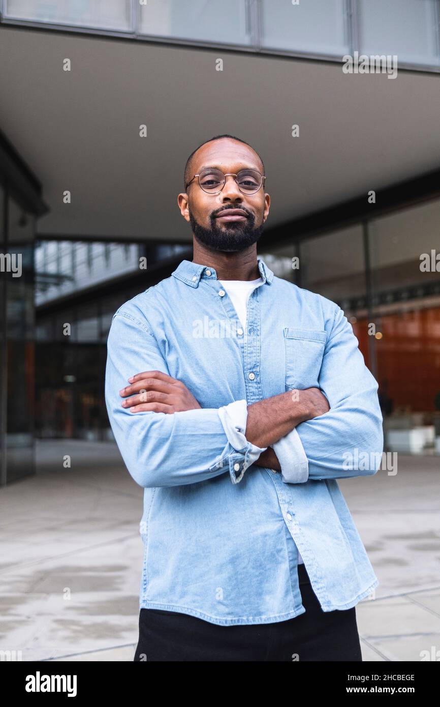 Casual man standing arms hi-res stock photography and images - Alamy