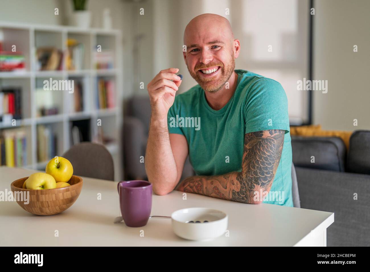 Man with fruit hi-res stock photography and images - Alamy