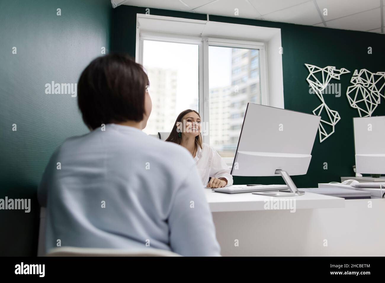 Travel agent meeting client hi-res stock photography and images - Alamy