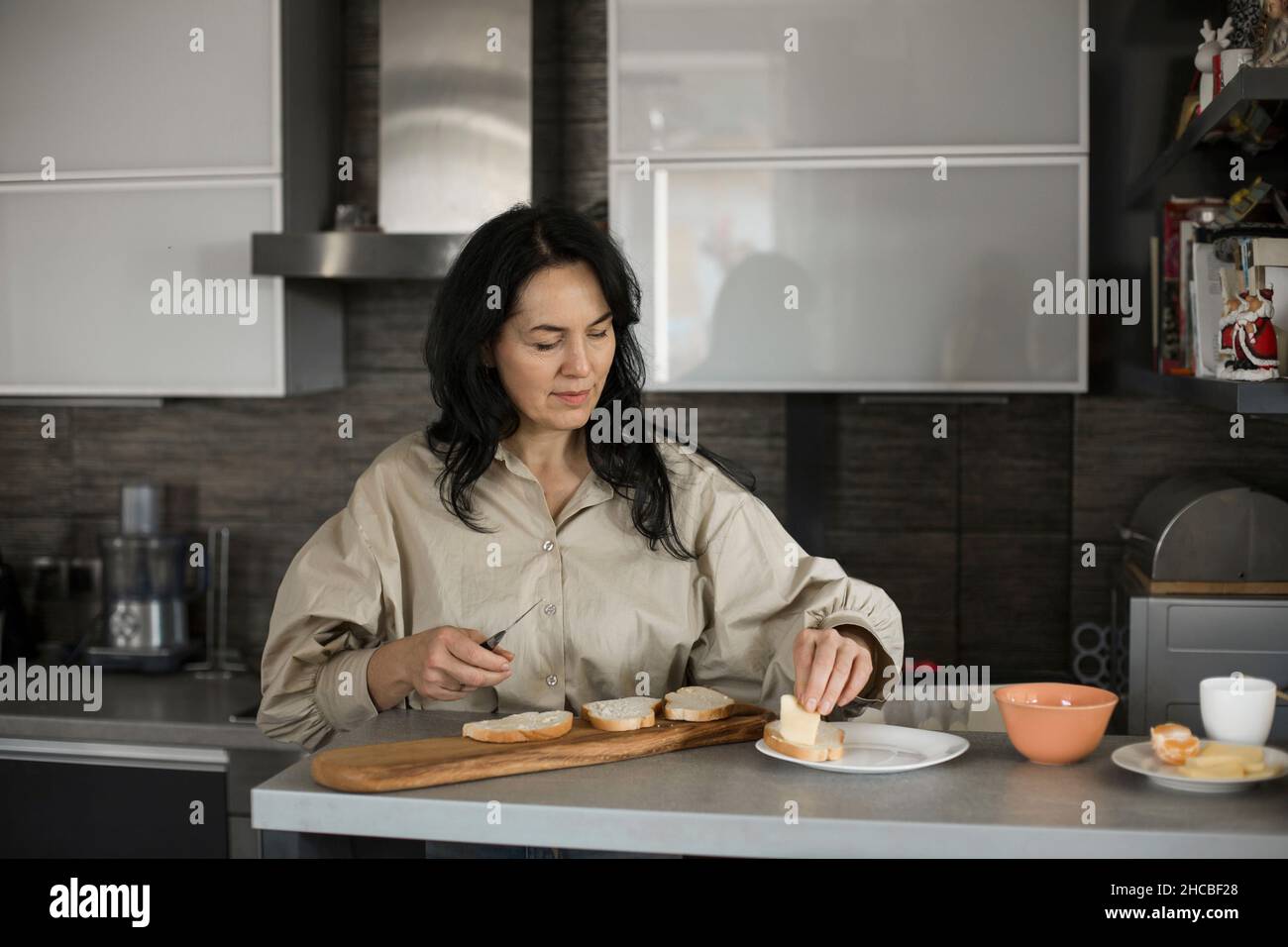 Spreading butter bread hi-res stock photography and images - Alamy