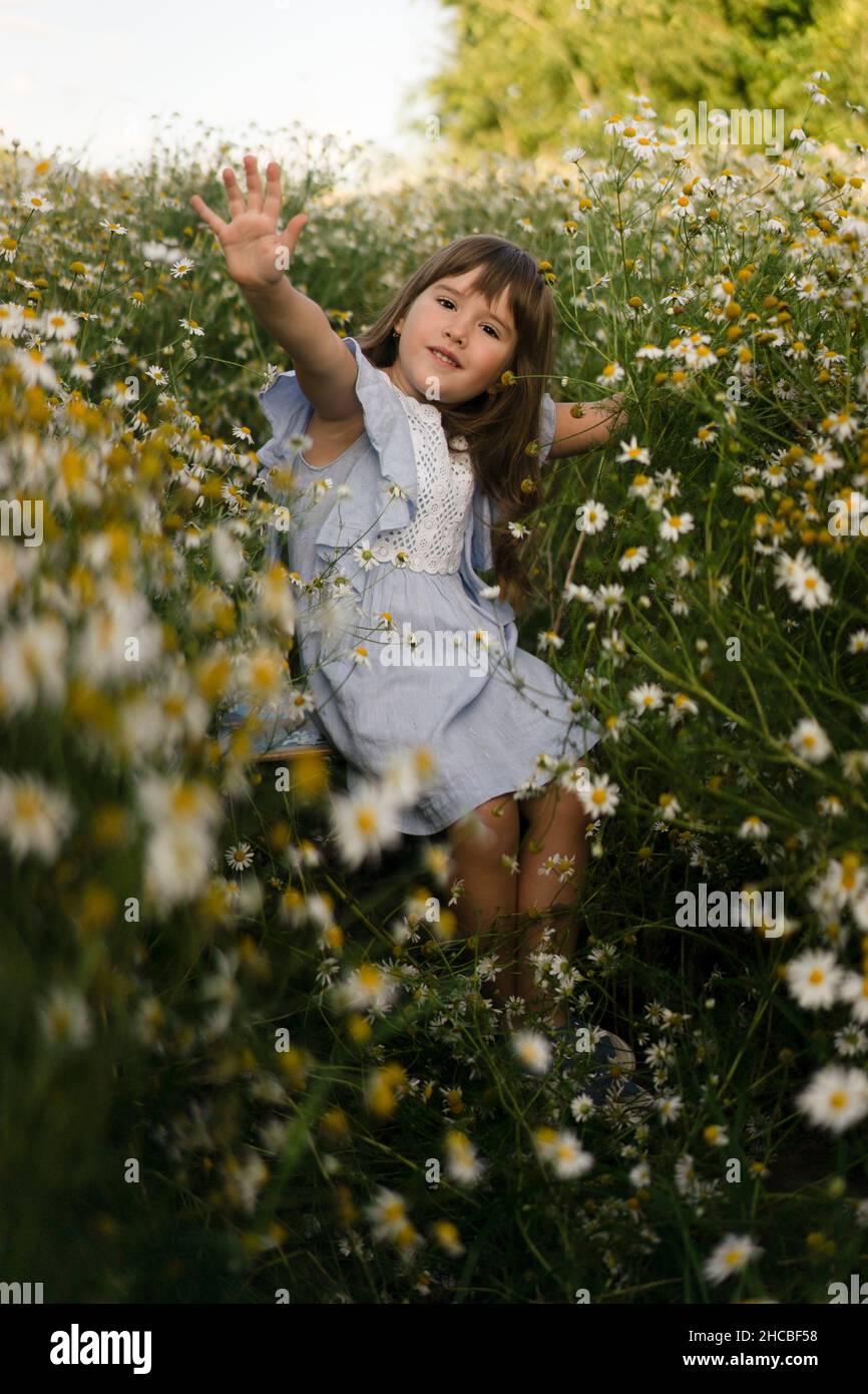Girl, waving, to camera hi-res stock photography and images - Alamy