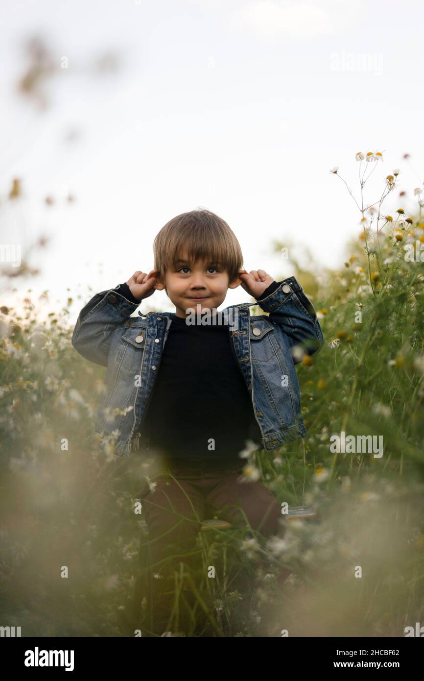 Standing boy pulling hi-res stock photography and images - Alamy