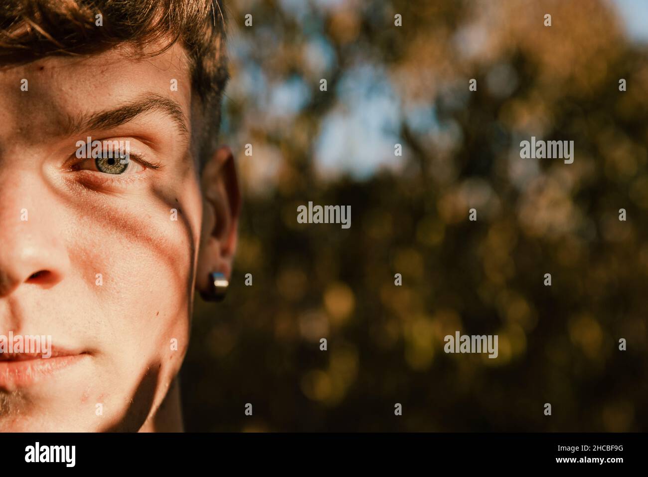 Man face looking up close up shadow hi-res stock photography and images ...