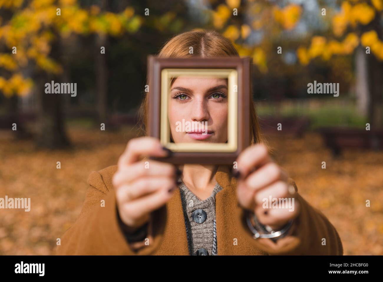Looking at photo frame hi-res stock photography and images - Alamy
