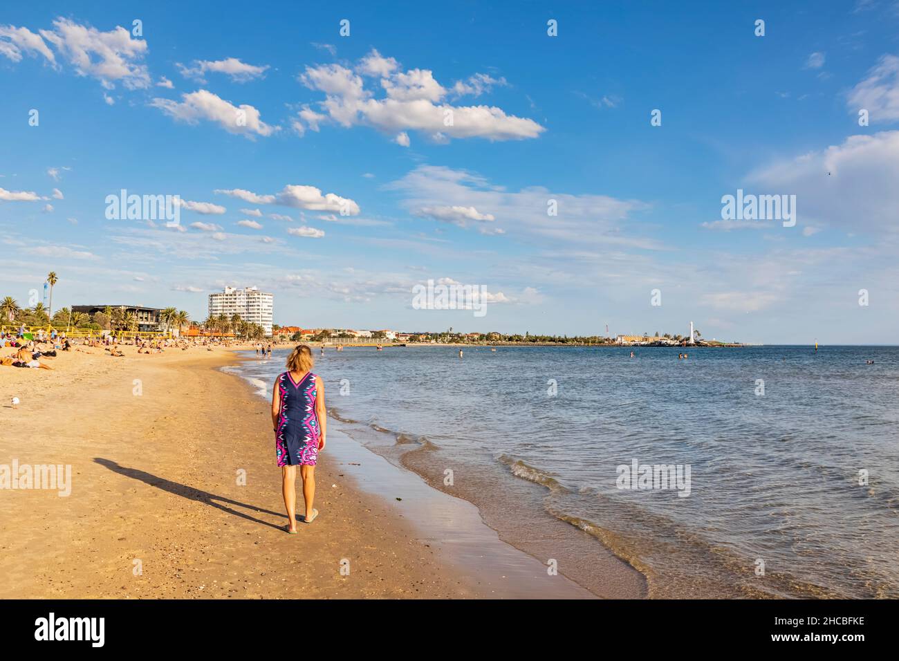 Australia, Victoria, Melbourne, Lone yacht floating in front of Saint ...