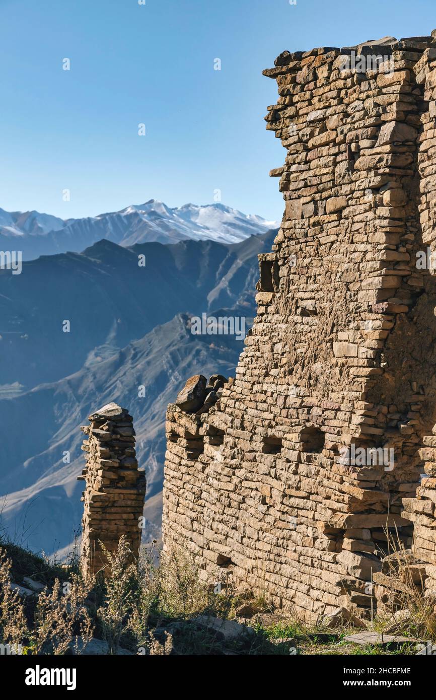 Goorskaya Bashnya with mountain range in background, Dagestan, Russia ...