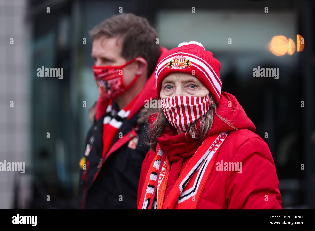 Fans are seen wearing masks outside the ground prior to the Sky Bet ...