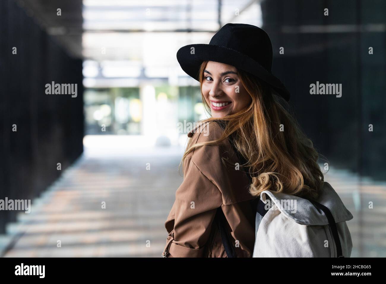 Woman trenchcoat rear view hi-res stock photography and images - Alamy