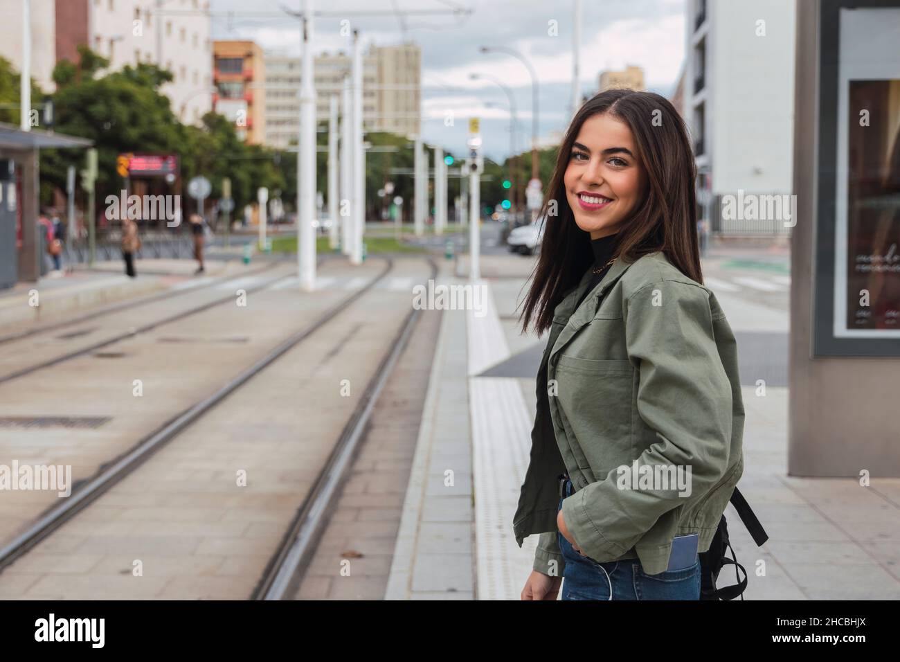Woman with her hands in her jacket pocket hi-res stock photography and ...