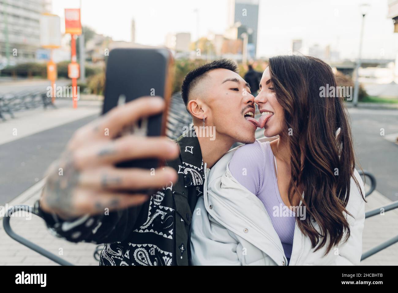 Touching their tongues hi-res stock photography and images - Alamy