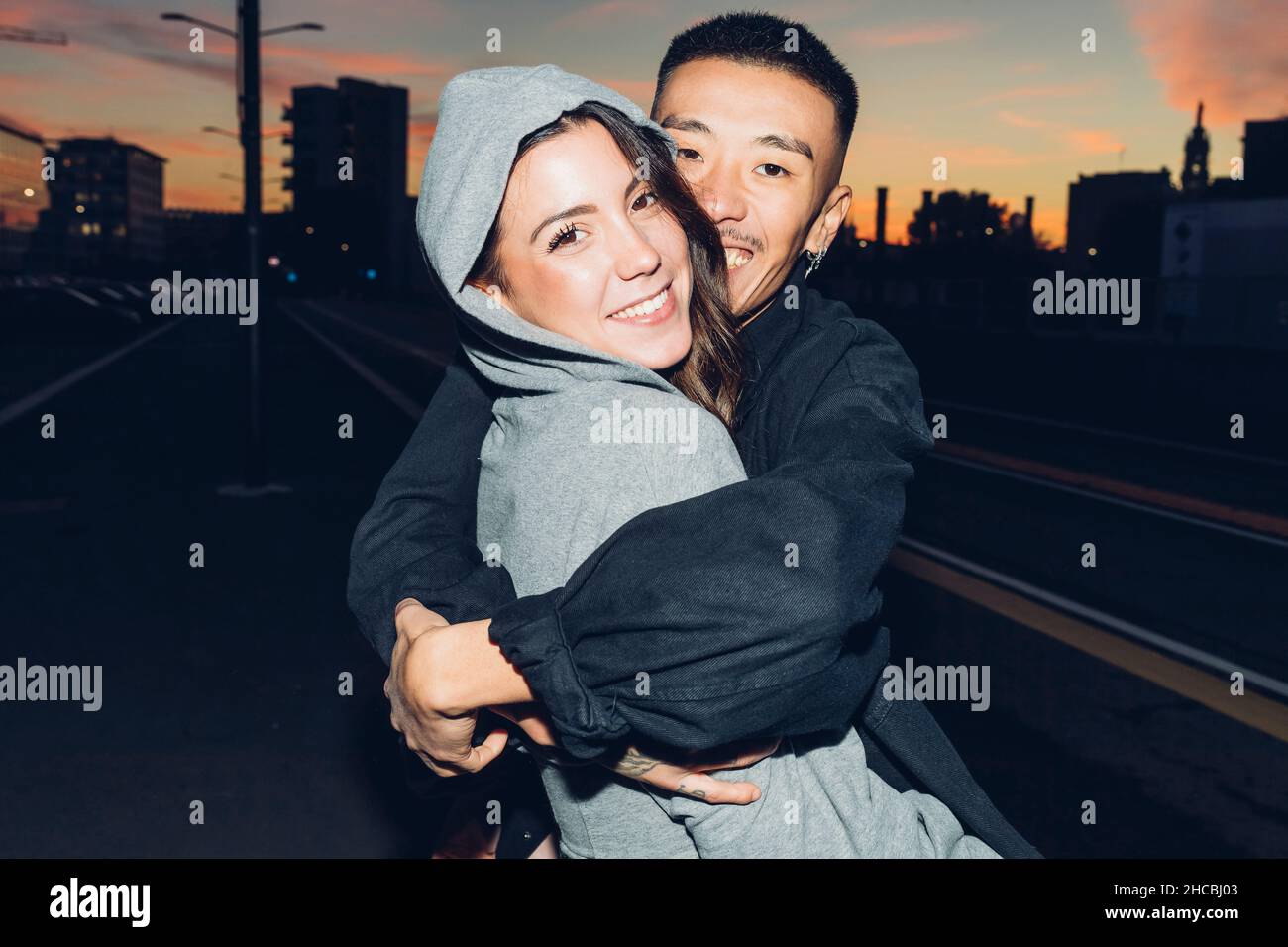 Asian girlfriend embracing boyfriend hi-res stock photography and ...