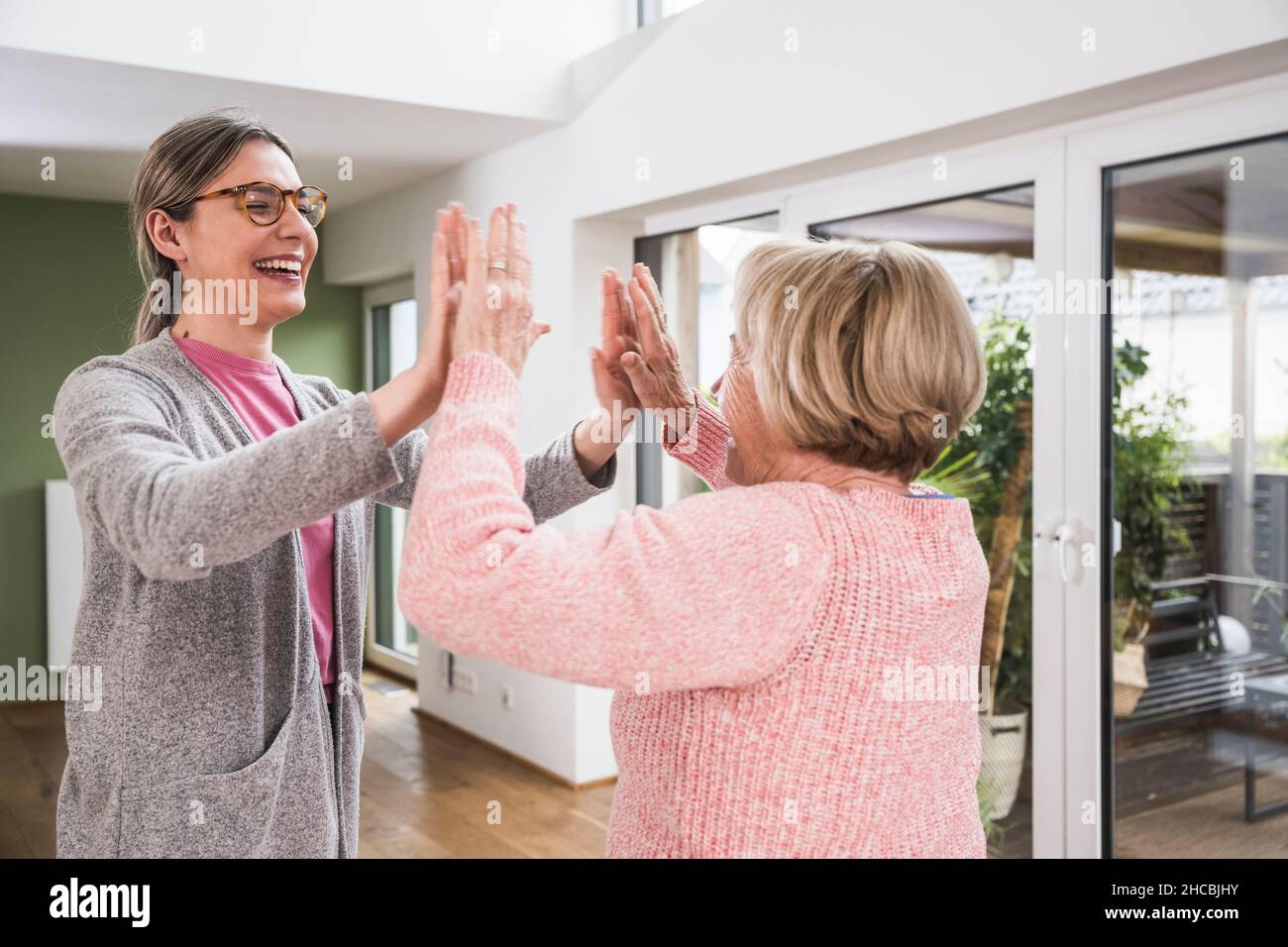Senior high five hi-res stock photography and images - Alamy