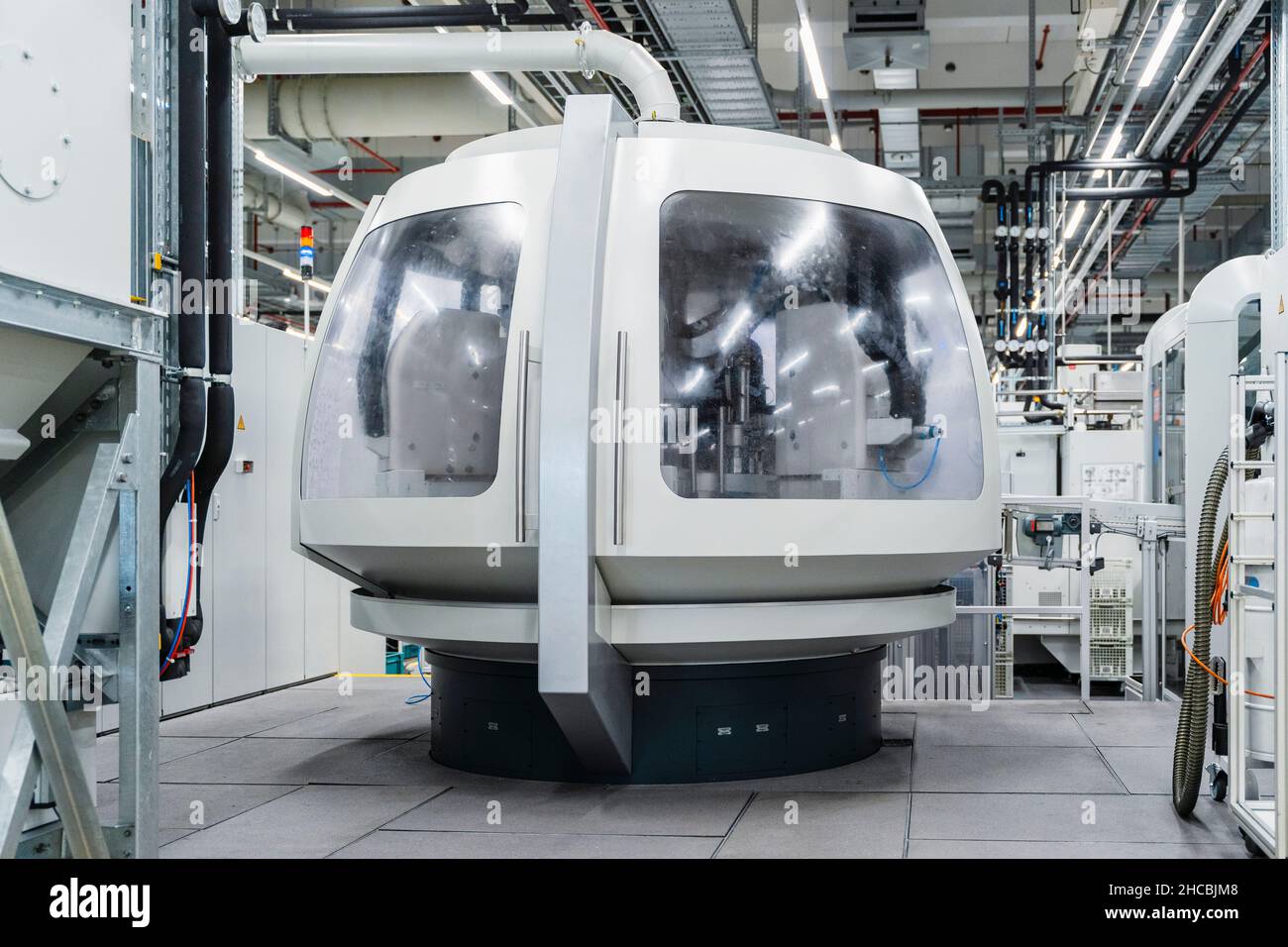 Modern automated cabin at illuminated industry Stock Photo - Alamy