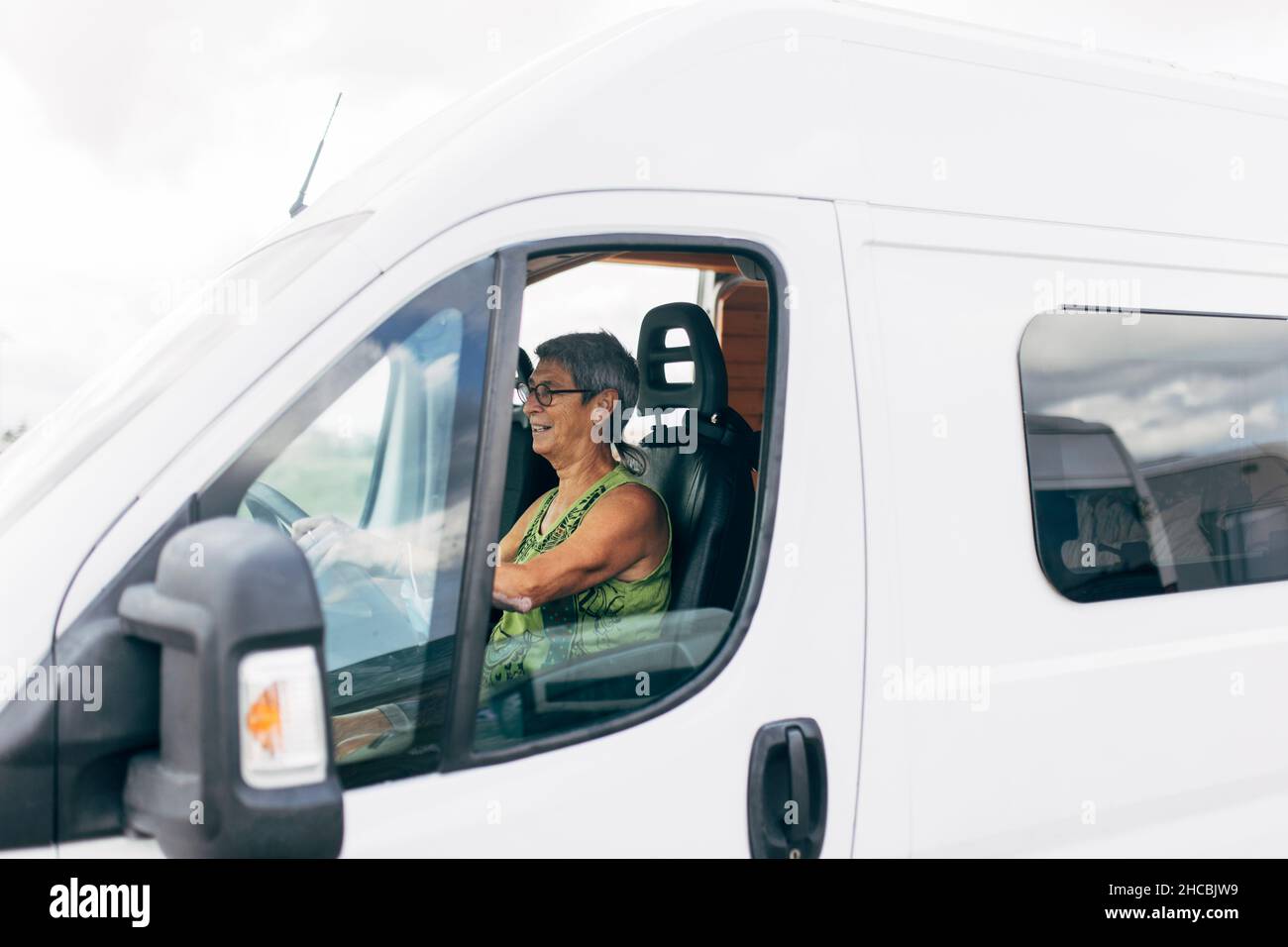 Senior woman driving motor home hi-res stock photography and images - Alamy