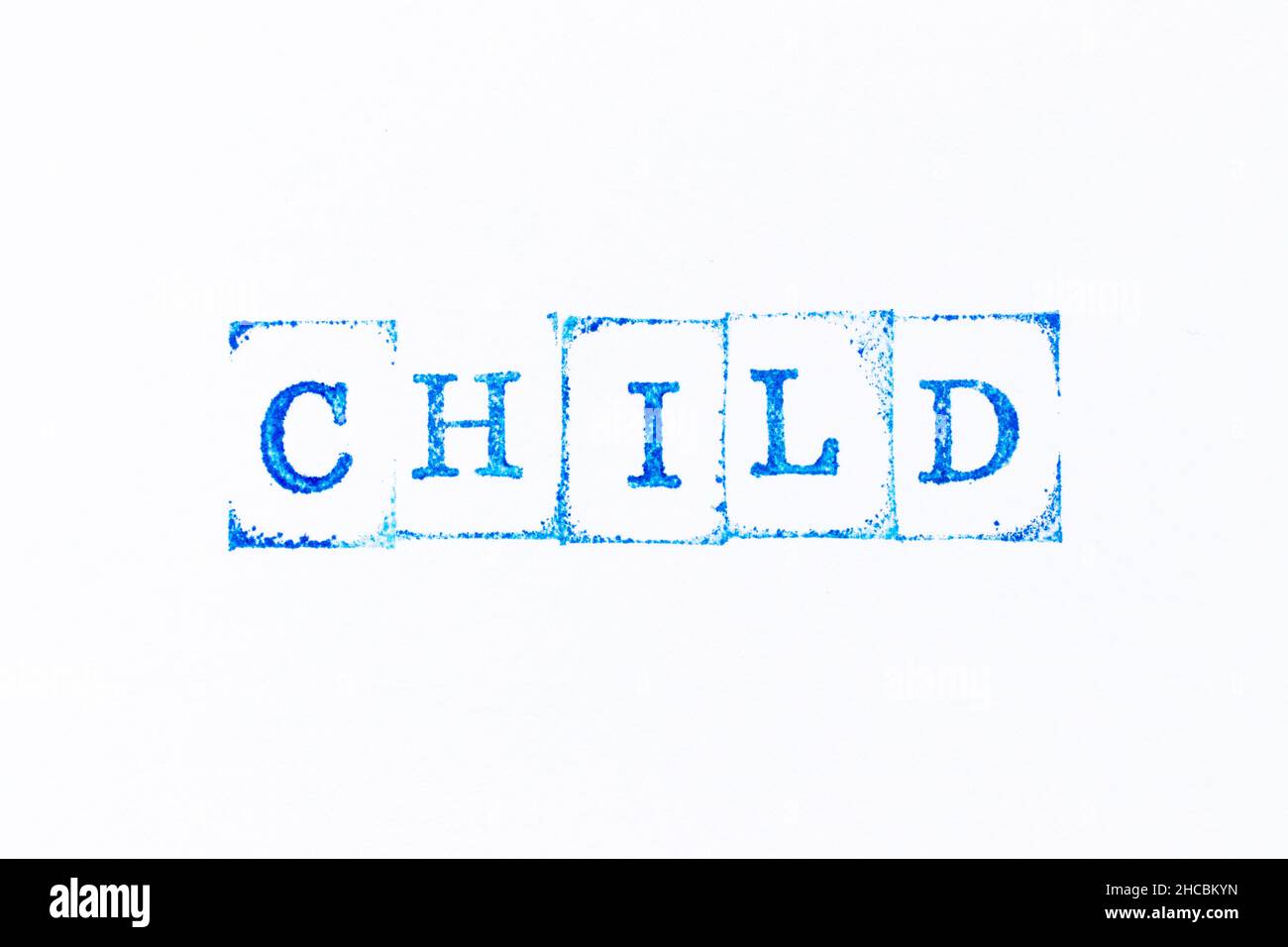 Blue color ink rubber stamp in word child on white paper background ...