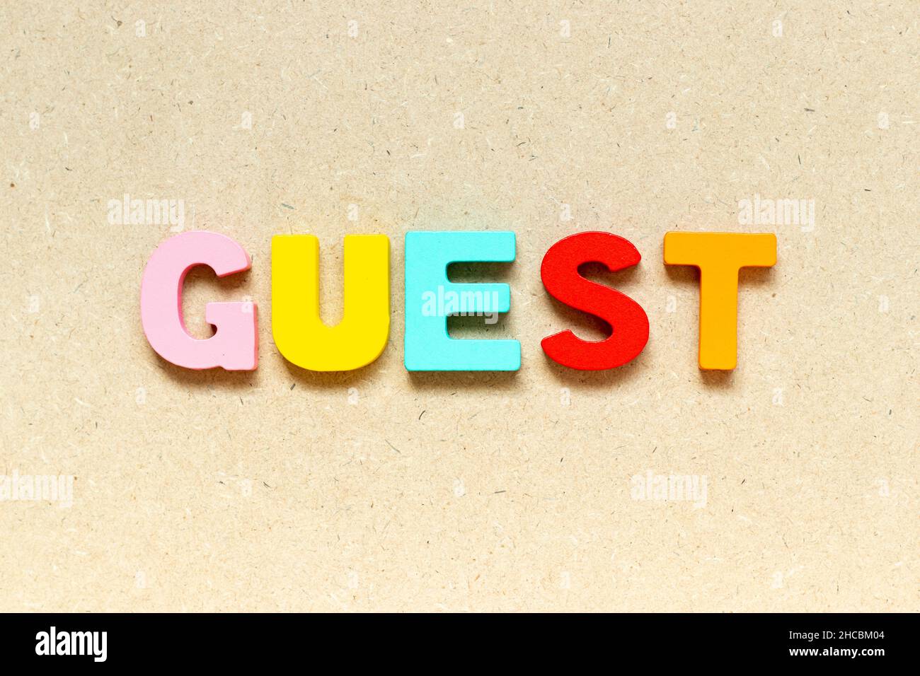 Color alphabet letter with word guest on wood background Stock Photo ...