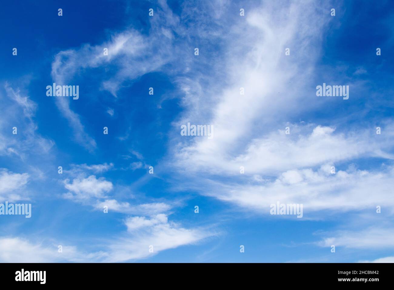 Clear blue color sky with white cloud background Stock Photo - Alamy