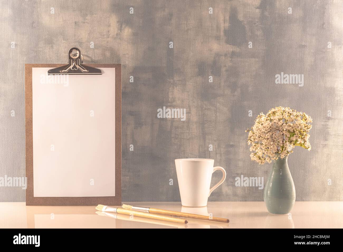 Clipboard with empty space to write a message, invitation, greetings ...