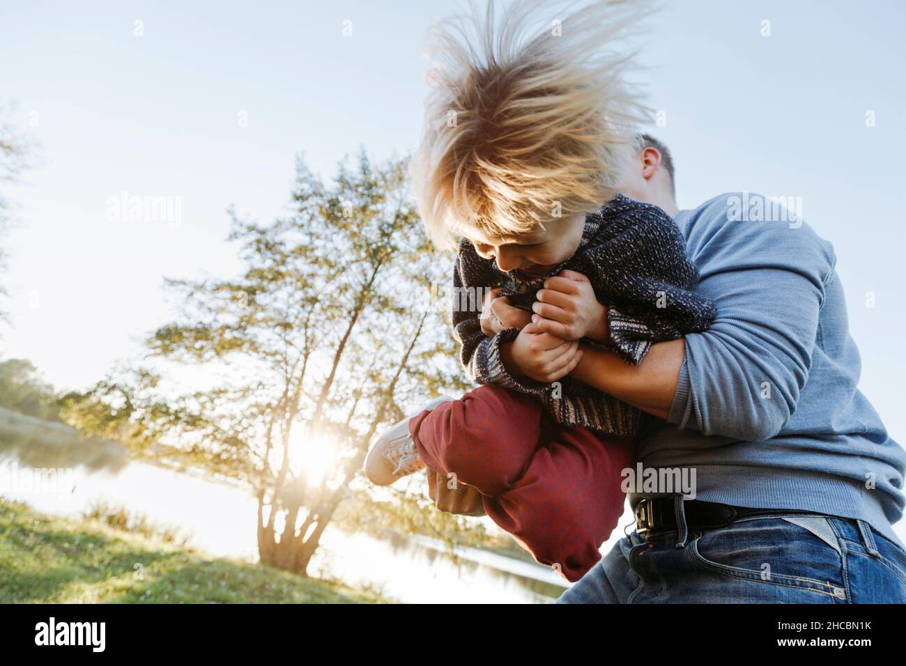Man arms aloft sky hi-res stock photography and images - Alamy