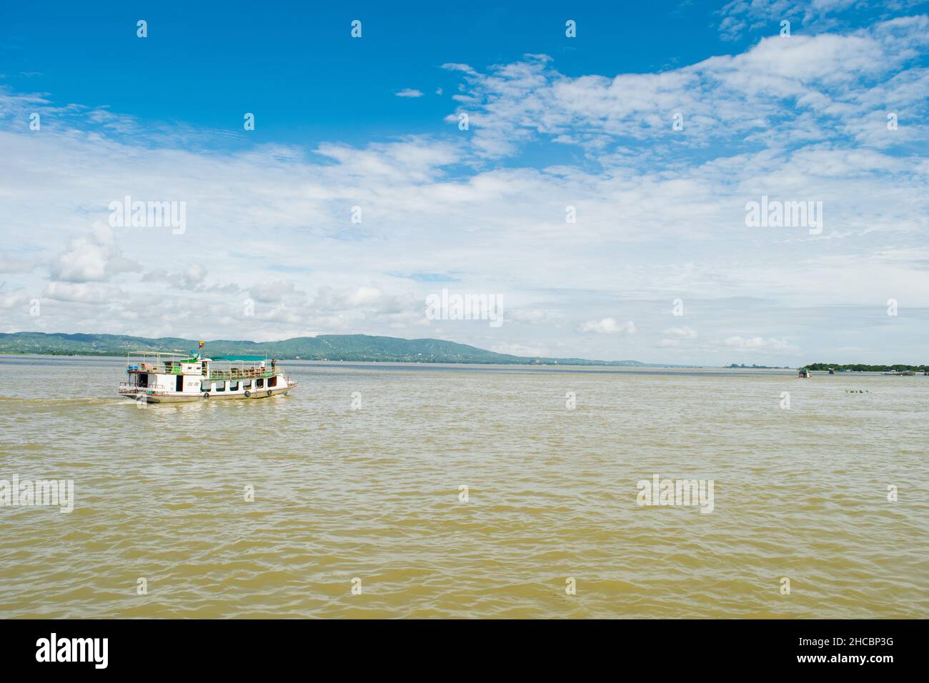 A panoramic view across Irrawaddy River, between the city of Mandalay ...