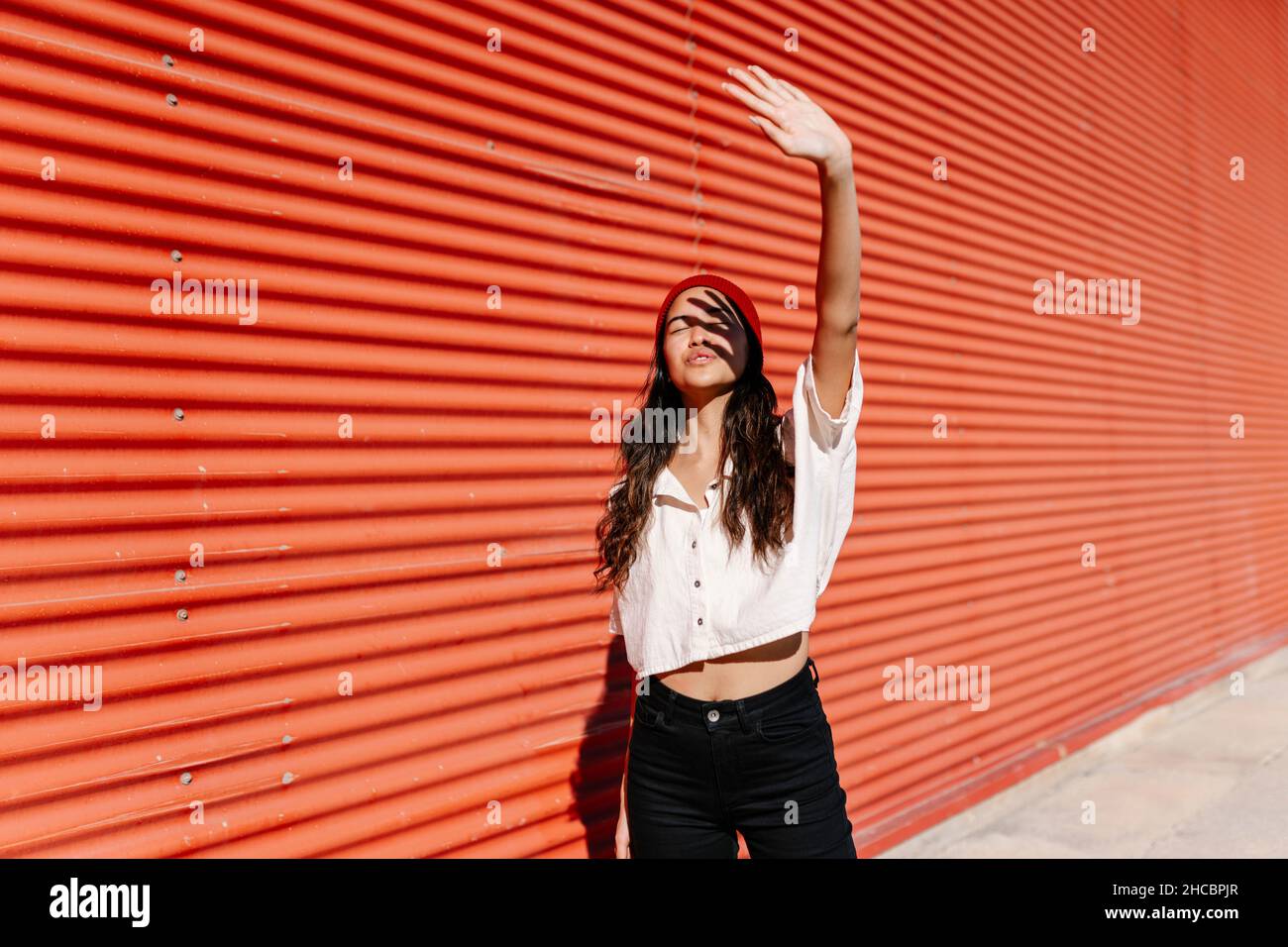 Woman shielding her face hi-res stock photography and images - Alamy