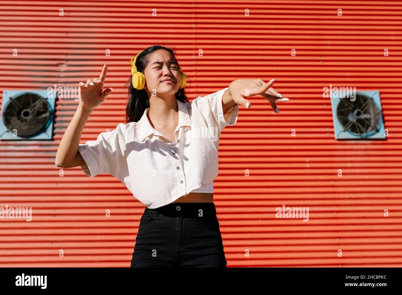 Young asian woman dancing hi-res stock photography and images - Alamy